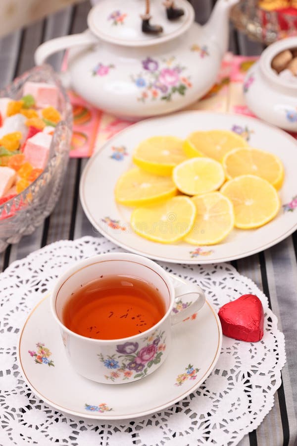 Warm cup of tea and sweets stock image. Image of card - 37762857