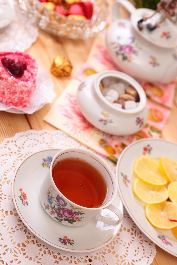 Warm cup of tea and sweets stock image. Image of food - 37928485