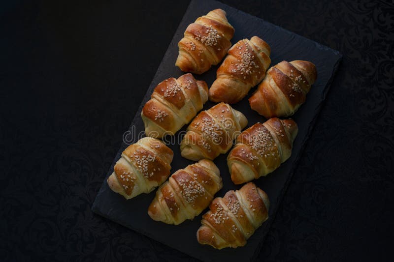 Warm Fresh Pastry on a Dark Stone Tray Stock Photo - Image of stone ...