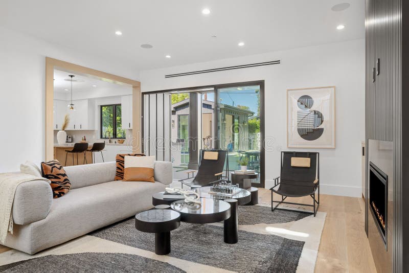 Warm and Inviting Living Space Features a Cozy Fireplace, a Comfortable ...