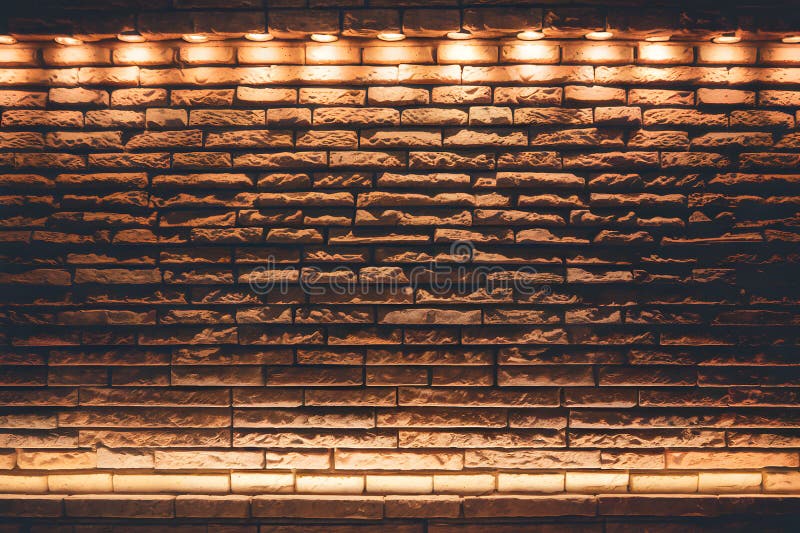 Warm Light Highlights Textured Brick Wall, Creating a Cozy Industrial ...