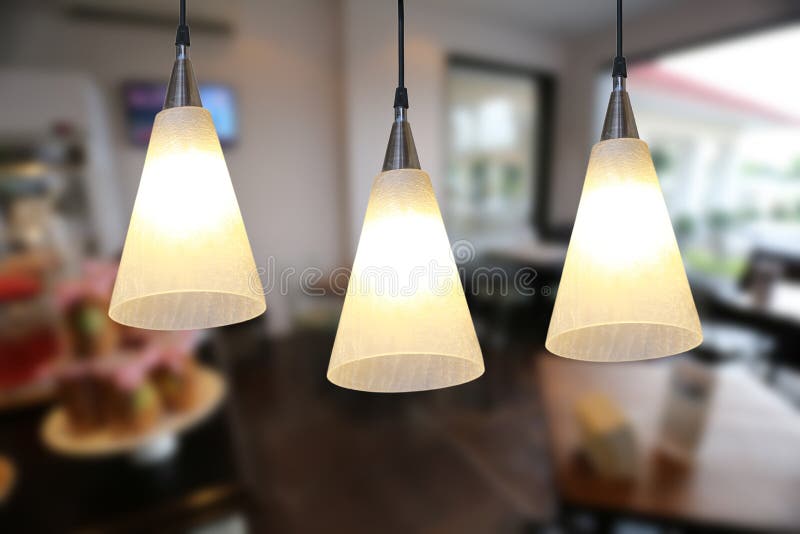 Warm Lighting Modern Ceiling Lamps in the Cafe. Stock Image - Image of ...