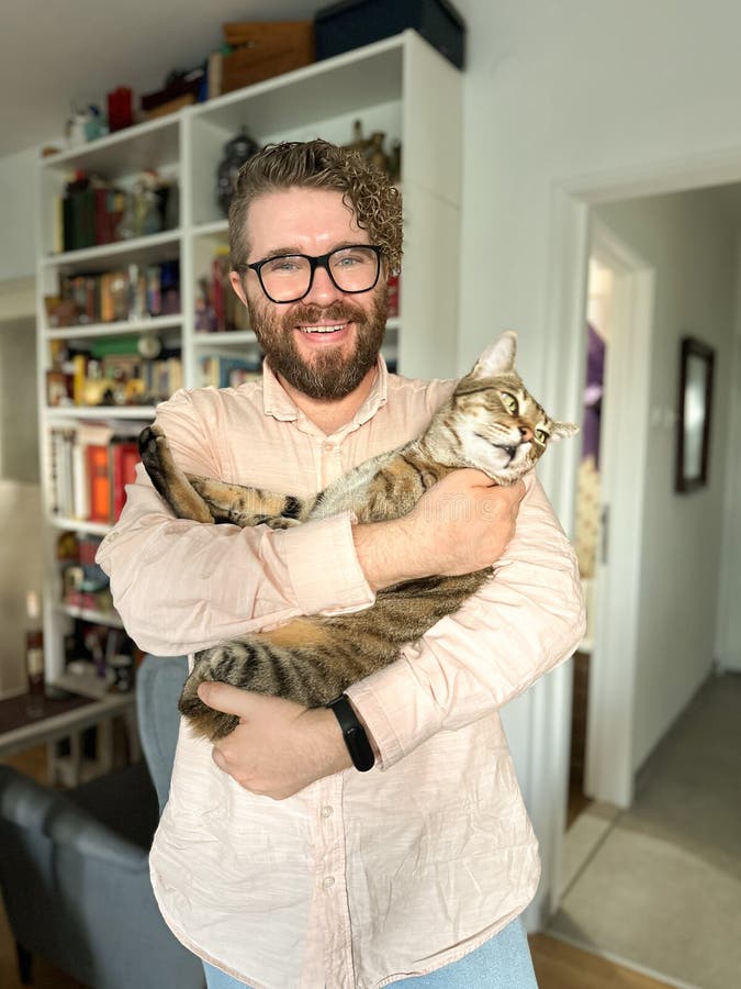 Warm Moment between a Millennial Man and His Cat, Bond and Affection ...