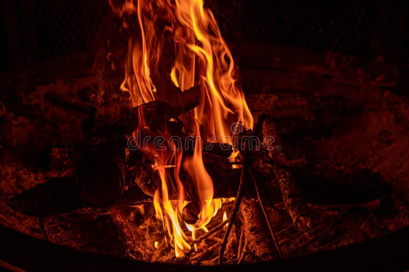 Warm Orange Flames of a Wood Fire Burning in an Outdoor Fire Pit Stock ...