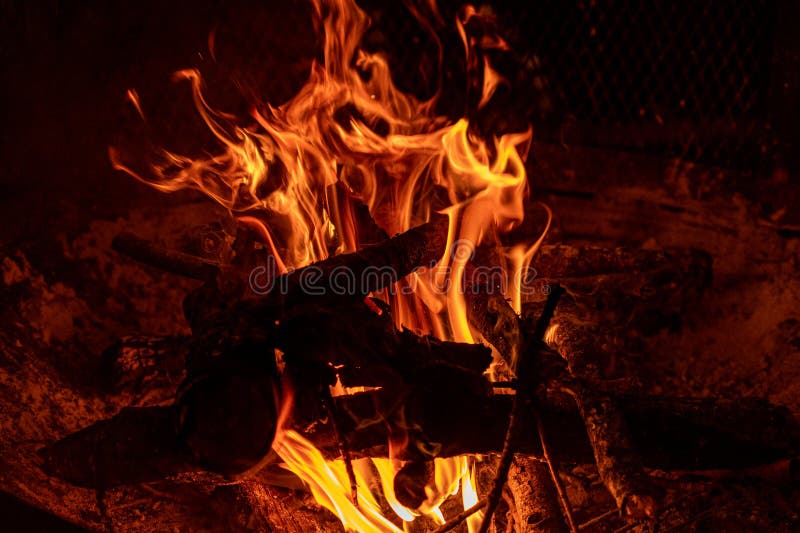 Warm Orange Flames of a Wood Fire Burning in an Outdoor Fire Pit Stock ...