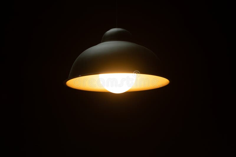 Warm Orange LED Lamp in the Ceiling on a Dark Background in the Center ...