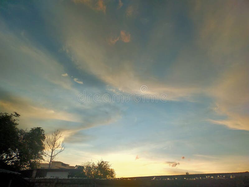 The Warm Sky in the Evening Stock Photo - Image of cumulus, sunset ...