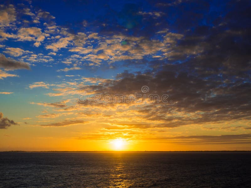 Warm Sunrise Over Ocean stock image. Image of ocean, beautiful - 97886553