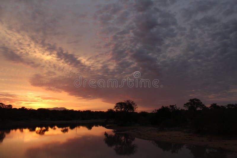 Warm Sunset with Cold Clouds. Stock Photo - Image of sunset, africa ...