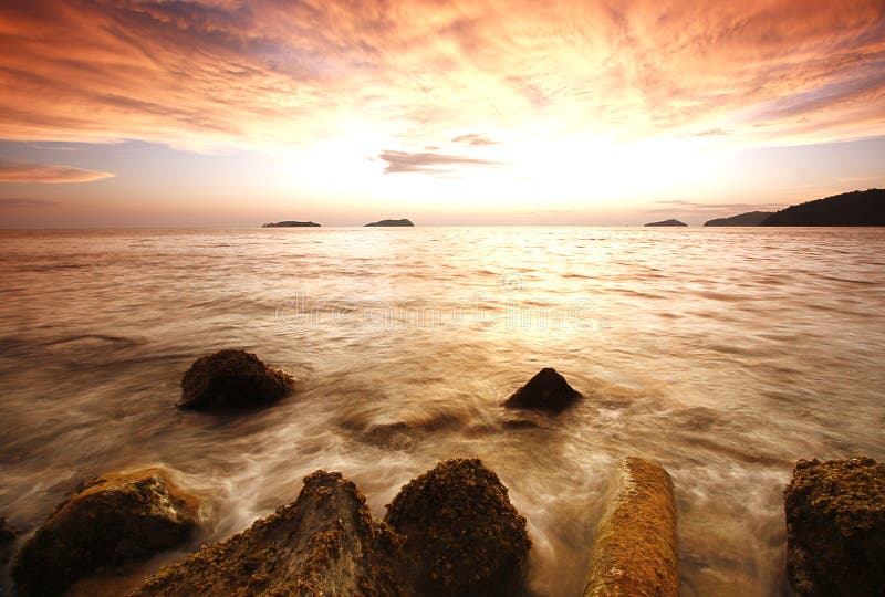 Warm sunset stock image. Image of beach, sunset, malaysia - 62528595