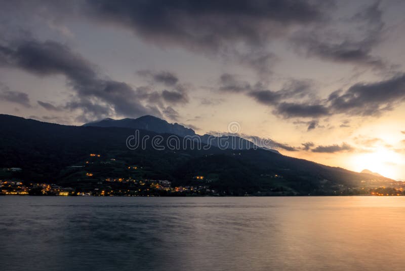 Warm Sunset Over Dark Mountain Lake Stock Photo - Image of landscape ...
