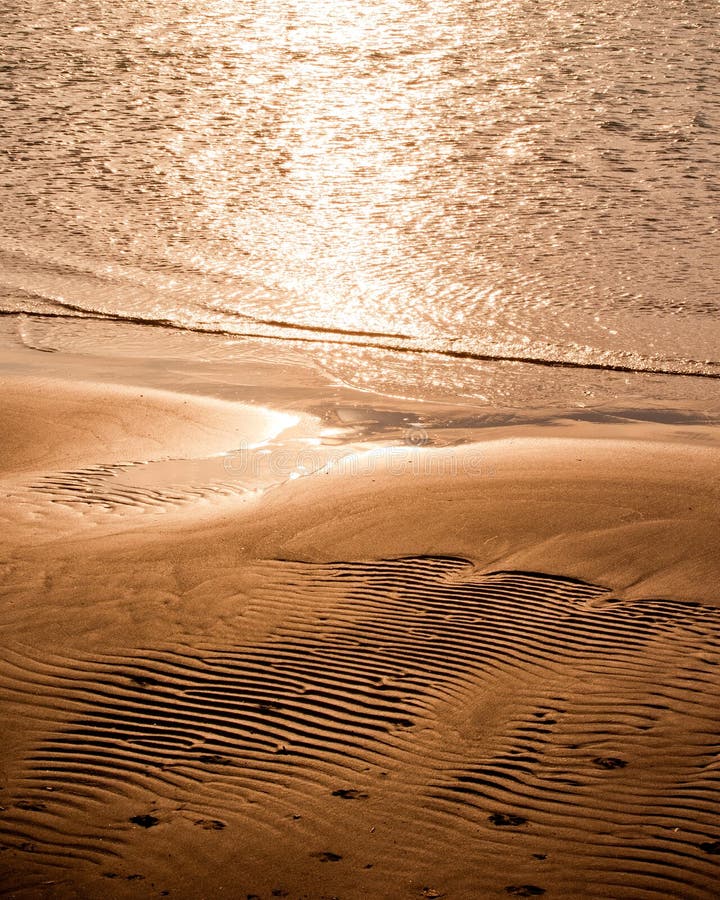 Warm Sunset on Textured Sand Beach Stock Photo - Image of alone ...