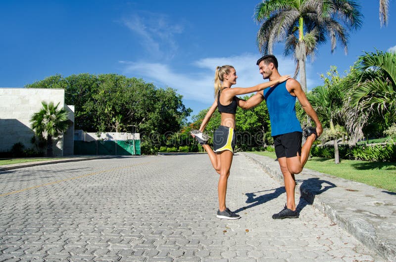 Warm up together in couple stock photo. Image of arms - 99107502