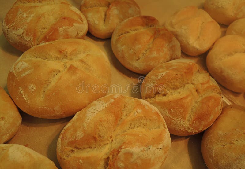 Warm Wheat Buns Cool Down on a Sheet of Baking Parchment Stock Image ...
