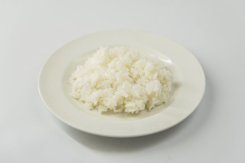 Warm white rice on a plate stock image. Image of isolated - 282908567