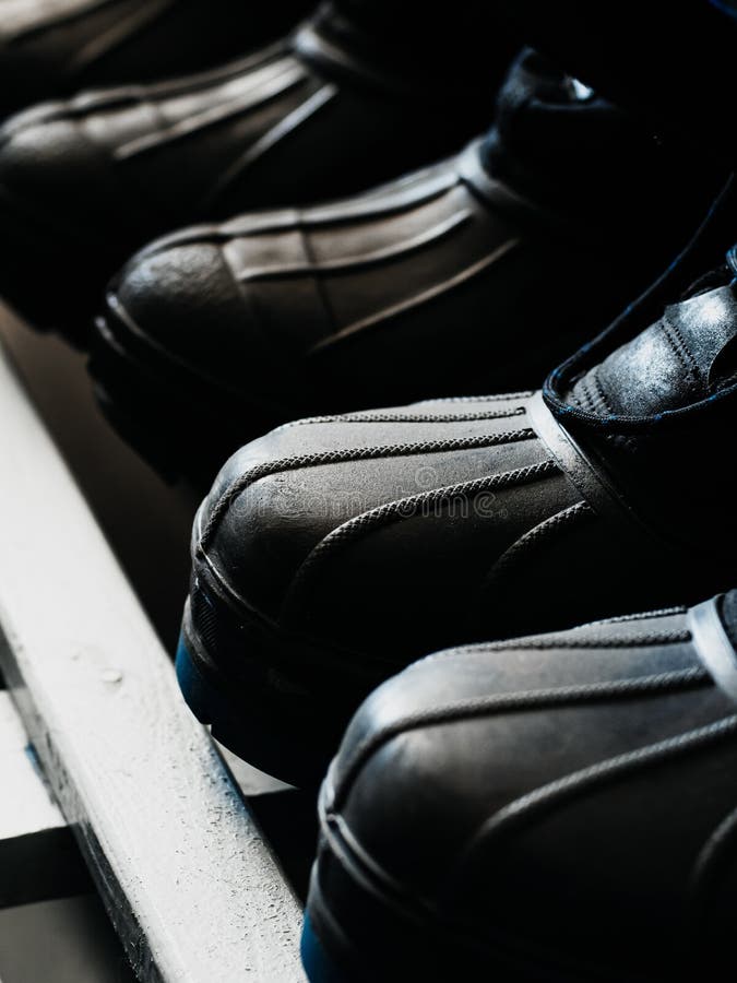 Warm Work Shoes. Workers Winter Industrial Boots Stand in Row in Drying ...