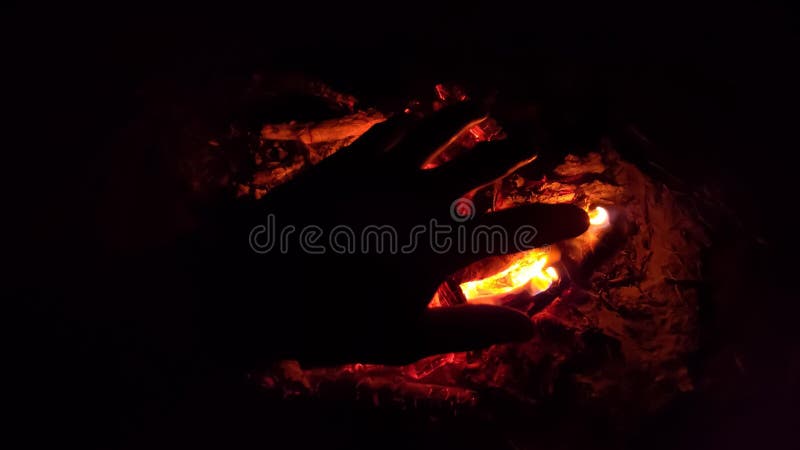 Warming Hand in Winter Night Stock Photo - Image of hues, texture ...