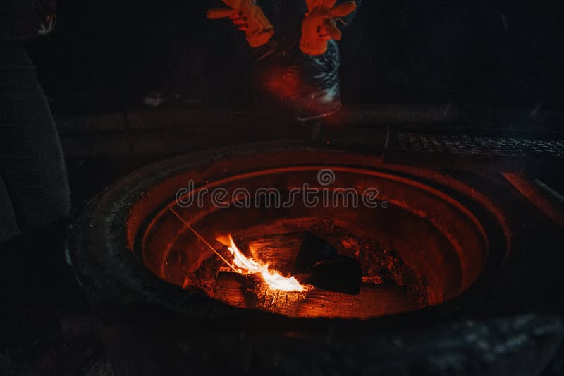 Warming Hands Over Fire at Laavu in Rovaniemi, Lapland in Winter Stock ...