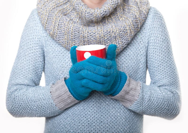 Warming Red Mug of Tea. Girl Warm Gloved Hands on a Mug Stock Photo ...