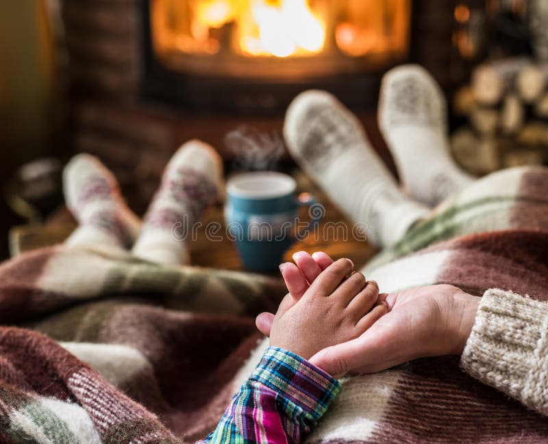 Warming and Relaxing Near Fireplace. Stock Photo - Image of hold, child ...