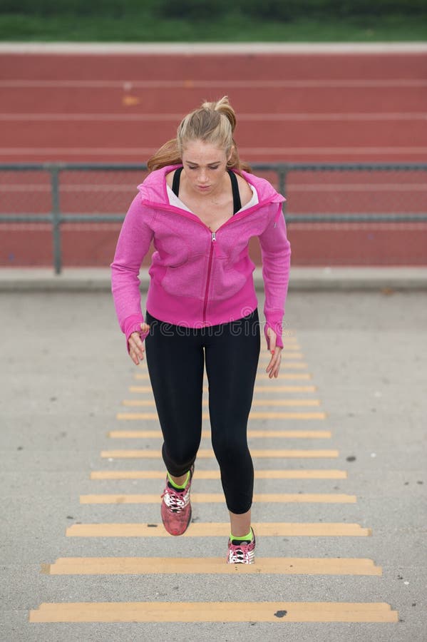 Warming Up in Pink Jacket with Small Steps Stock Image - Image of ...