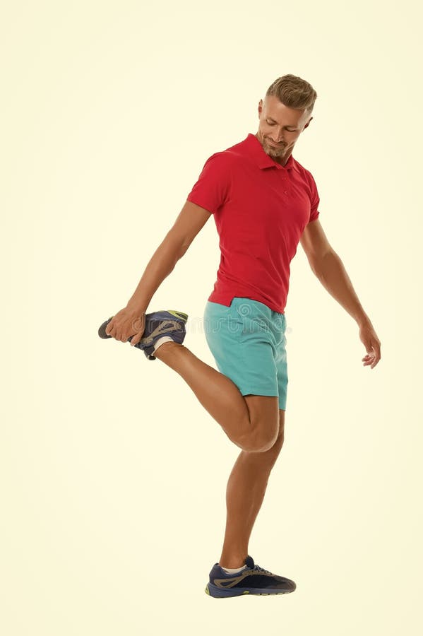 Warming Up with Some Stretches. Athletic Man Stretching Isolated on ...