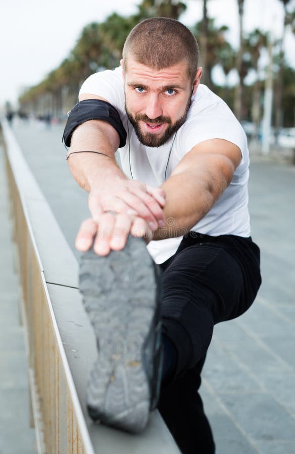 Warming up young man stock photo. Image of shape, palm - 270421130