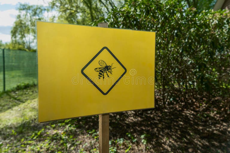 Warning Bees - Yellow Sign Featuring a Bee in Front of the Beehive ...