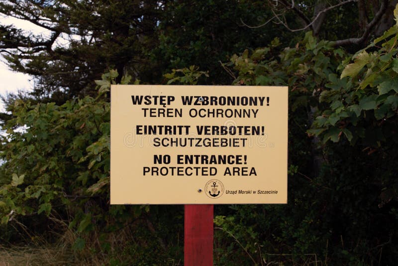 A Warning Board in Several Languages Informing about No Entry and ...