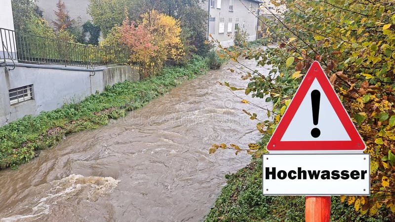 Warning Flood Sign on a Stream Stock Photo - Image of german, danger ...