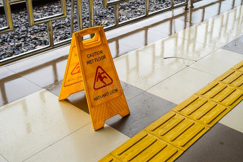 Warning Instructions, Caution Sign Wet Floor on Floor Stock Image ...