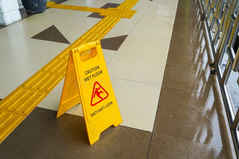 Warning Instructions, Caution Sign Wet Floor on Floor Stock Photo ...