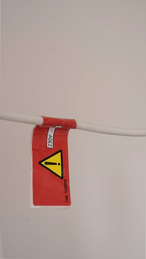 Warning Label for Voltage on the Wire Stock Photo - Image of caution ...
