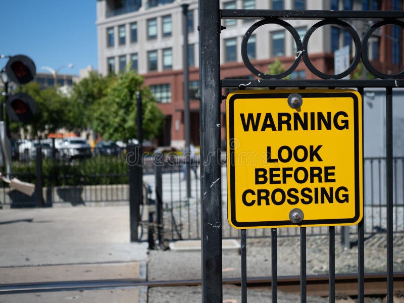 Warning Look before Crossing Yellow Warning Sign at Train Crossing in ...