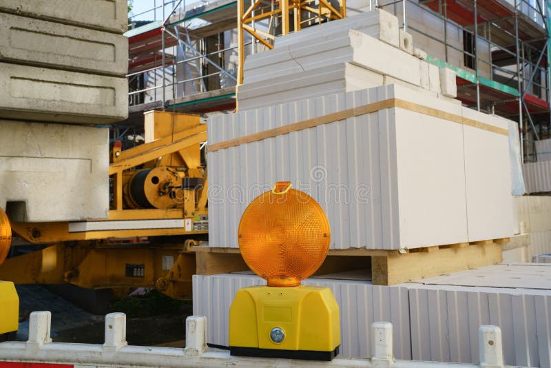 A Warning Orange Light at a Construction Site Stock Photo - Image of ...