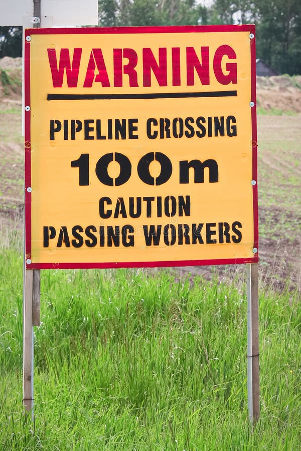 Warning Pipeline Crossing Caution Sign Stock Photo - Image of pipe ...