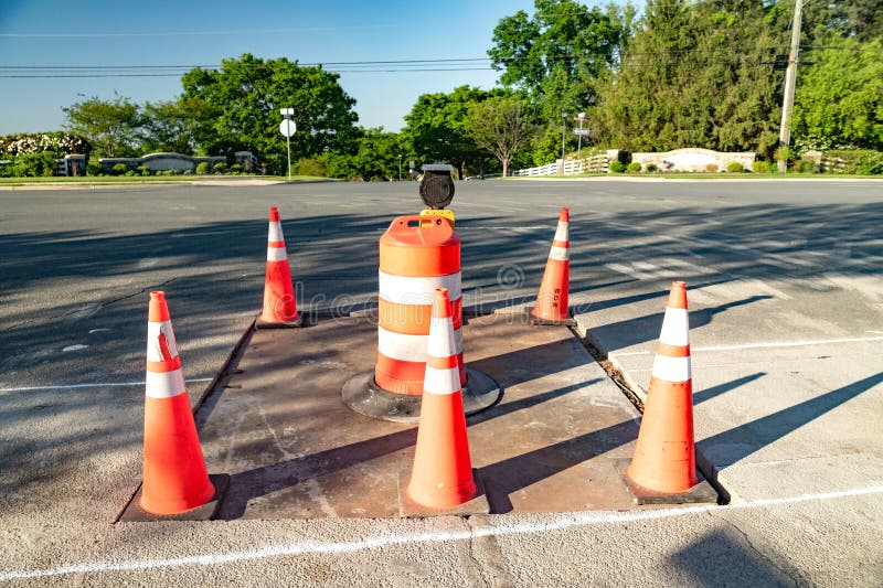 Warning Red Cones on the Asphalt. Warning of Danger on the Road Stock ...
