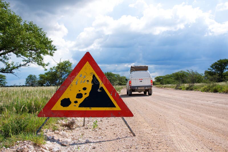 Warning of Road Sign - Falling Stones on the Road Stock Image - Image ...