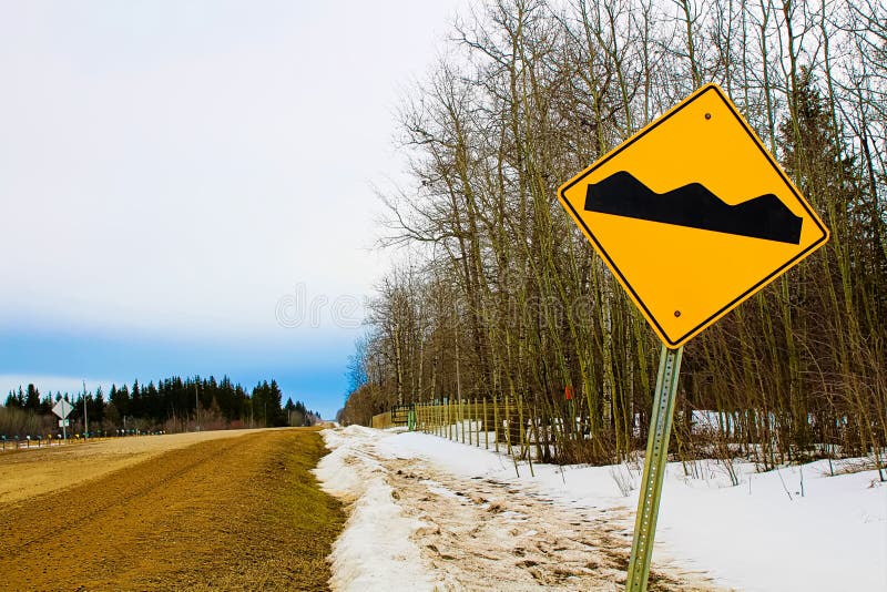 Uneven Road Ahead. Danger Road Sign Stock Photo - Image of asphalt ...