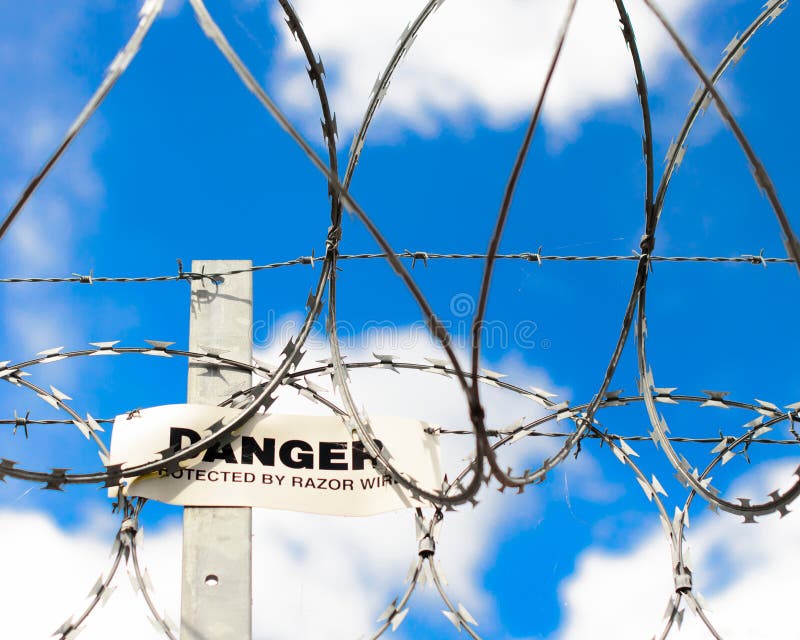 Warning Sign and Barbed Wire Stock Image - Image of iron, warning ...