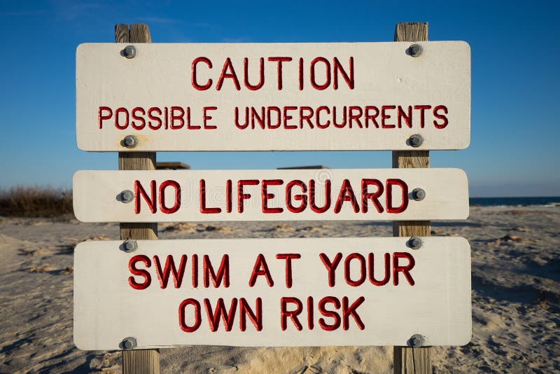Warning sign on the beach stock image. Image of safety - 71388457
