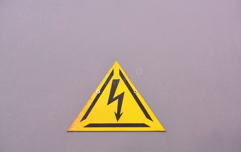 A Warning Sign of Danger on a Purple Background. Stock Photo - Image of ...