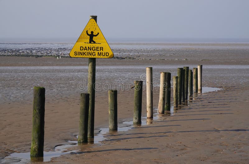 Warning Sign on Dangerous Mud Stock Photo - Image of yellow, uphill ...