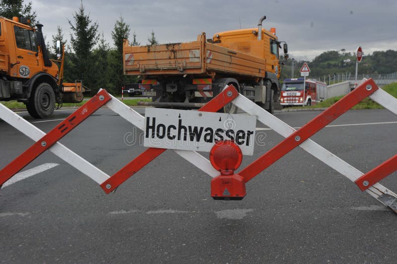 Warning Sign Flood and Danger of Flooding Stock Photo - Image of ...