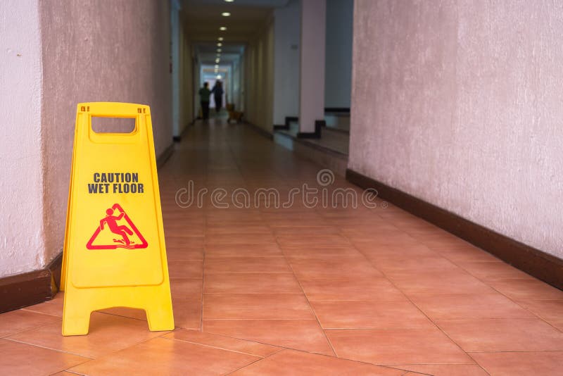 Warning Sign on the Floor in Hotel Corridor Stock Photo - Image of ...