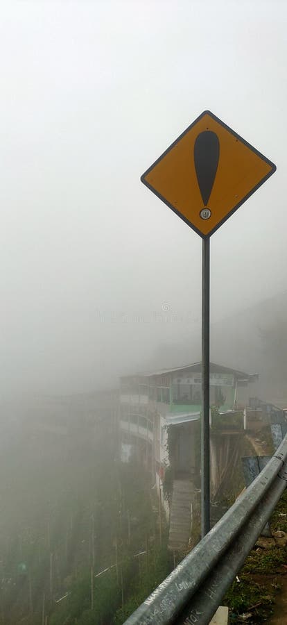 Warning sign in a fog stock photo. Image of warning - 262718992