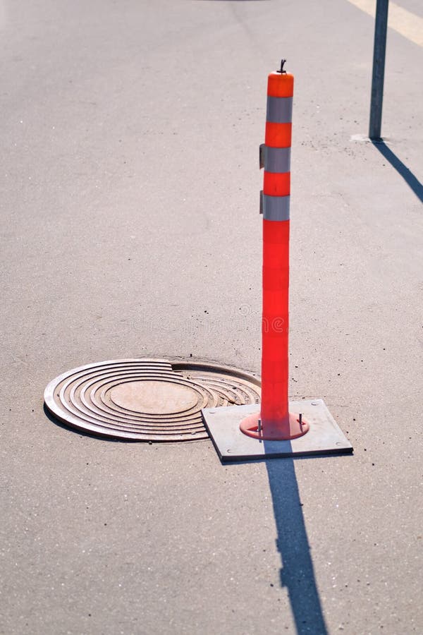 Warning Sign in Front of a Broken Sewer Hatch Stock Photo - Image of ...