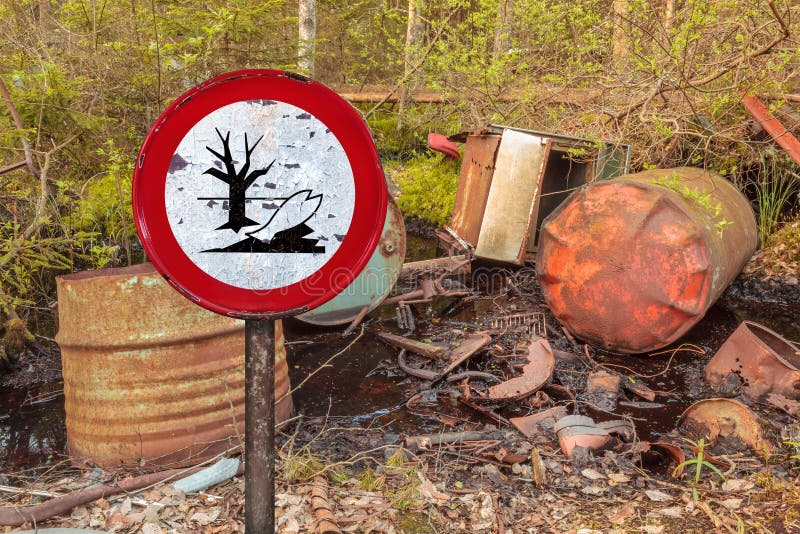 Warning Sign in Front of Toxic Waste Stock Image - Image of abandoned ...