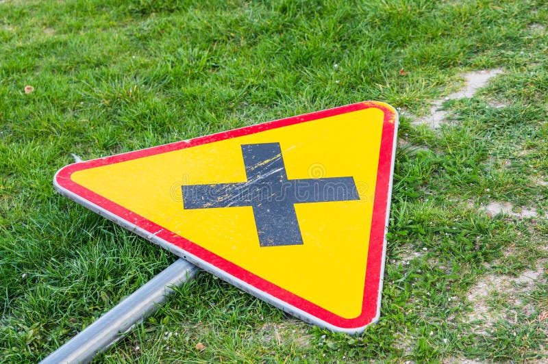 Warning Sign on a Grassy Ground Stock Photo - Image of line, black ...