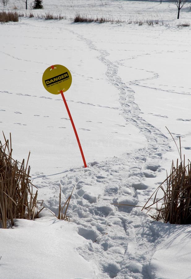Warning sign on the Ice stock image. Image of safe, time - 176501659